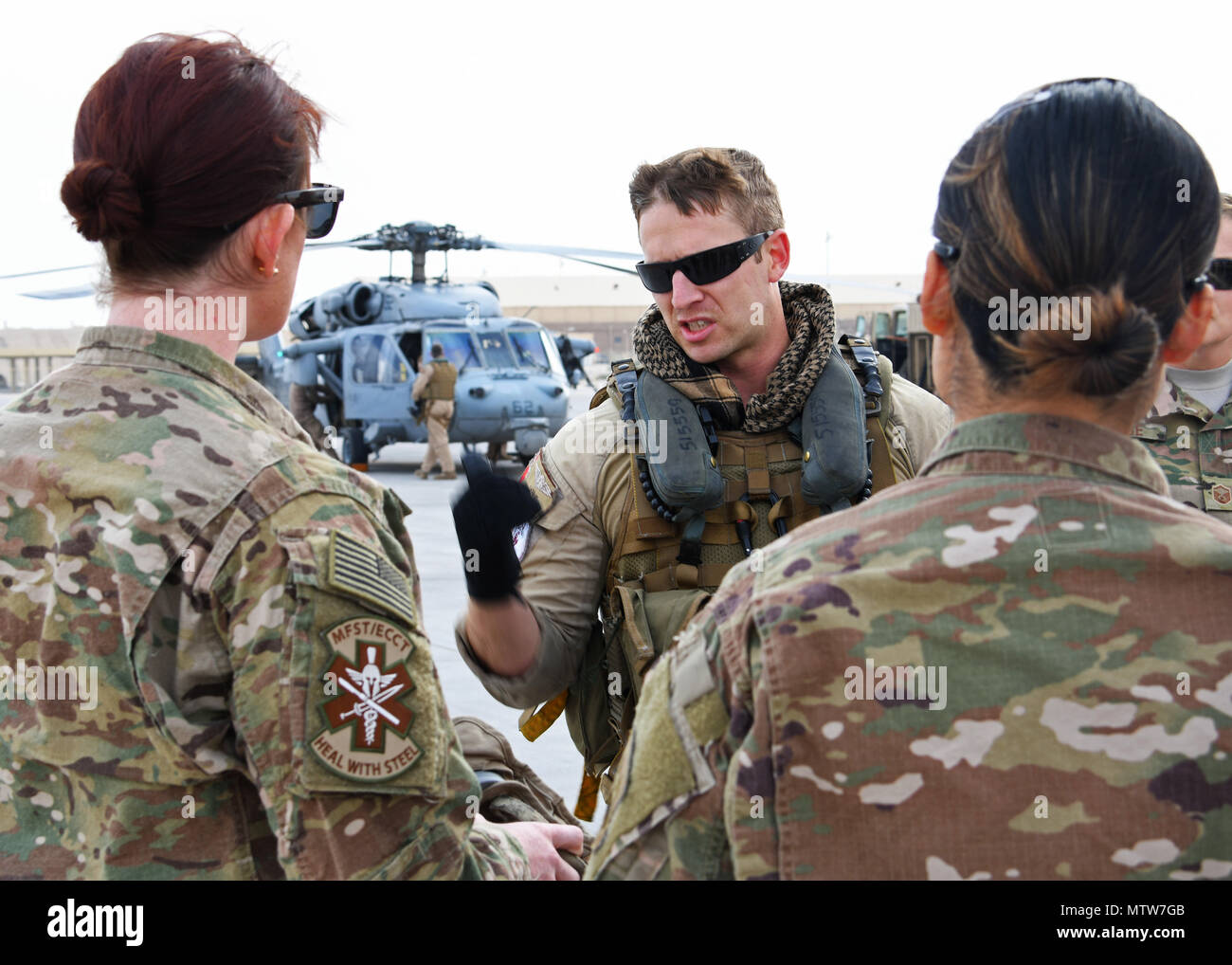 U.S. Navy Petty Officer 2nd Class Nick Flynn, a naval aircrewman ...
