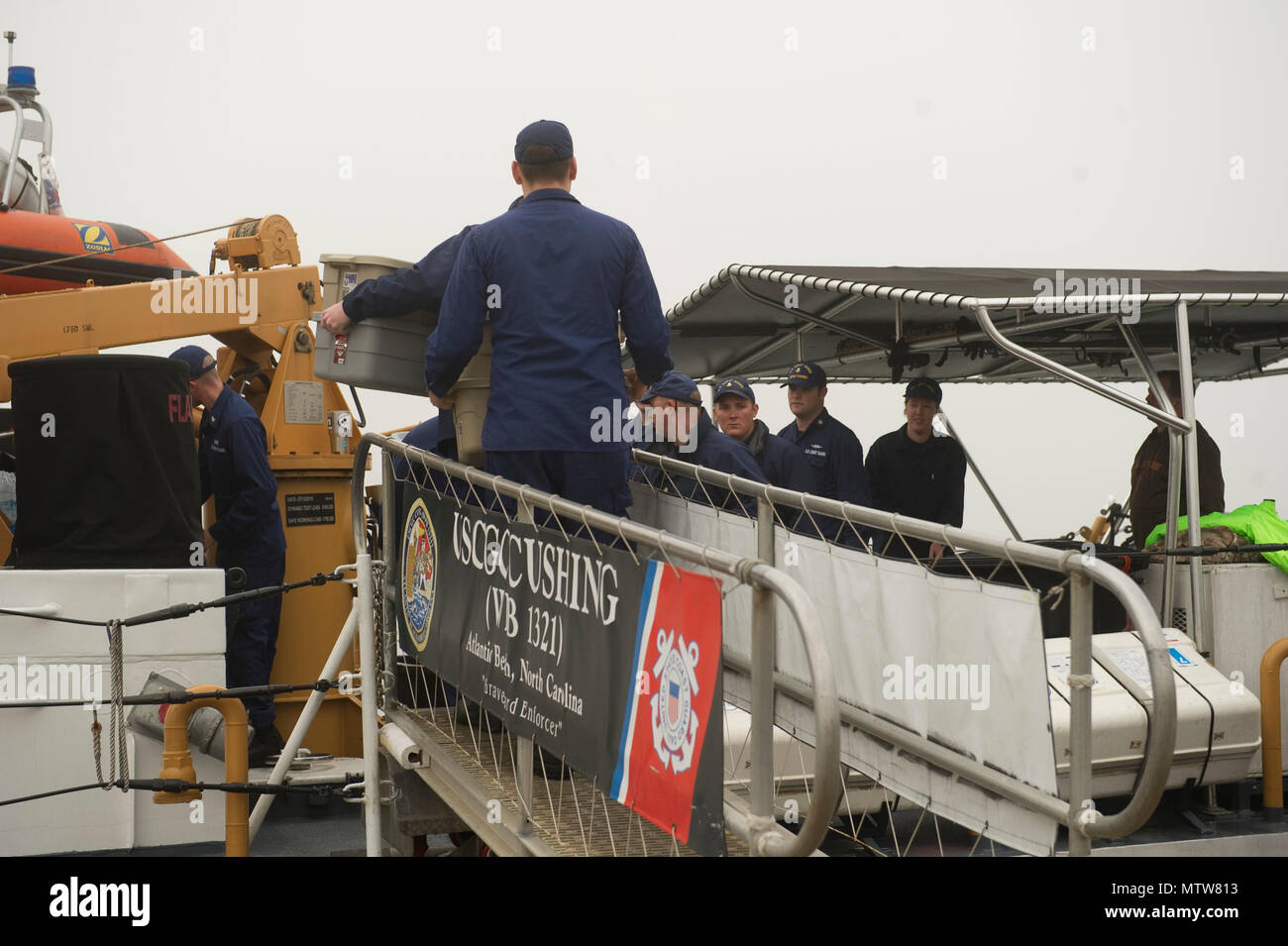 The crew of Coast Guard Cutter Cushing out of Atlantic Beach, North ...