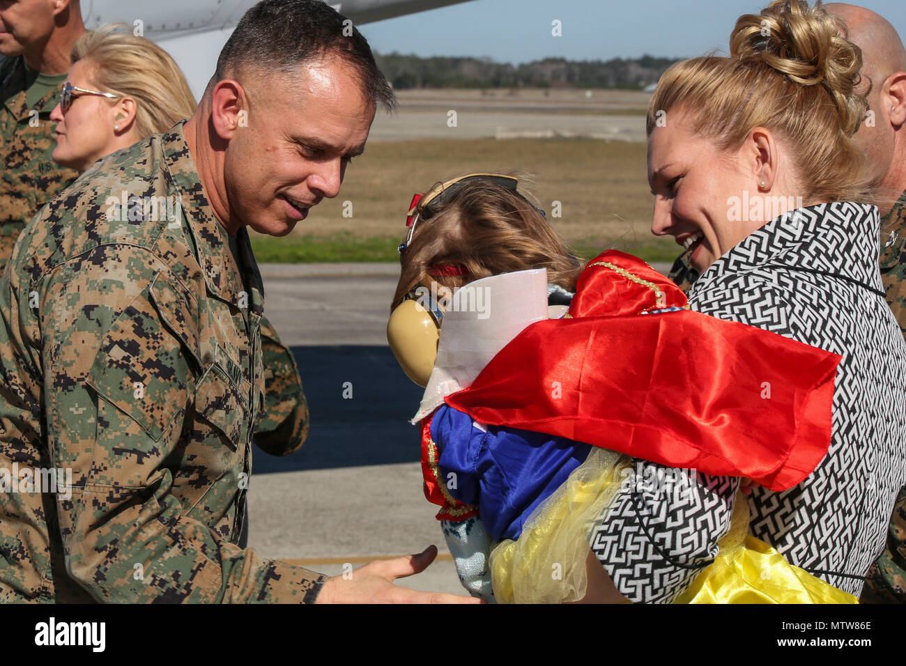 Col. Frank Latt, left, and his family welcome Brig. Gen. Matthew G ...