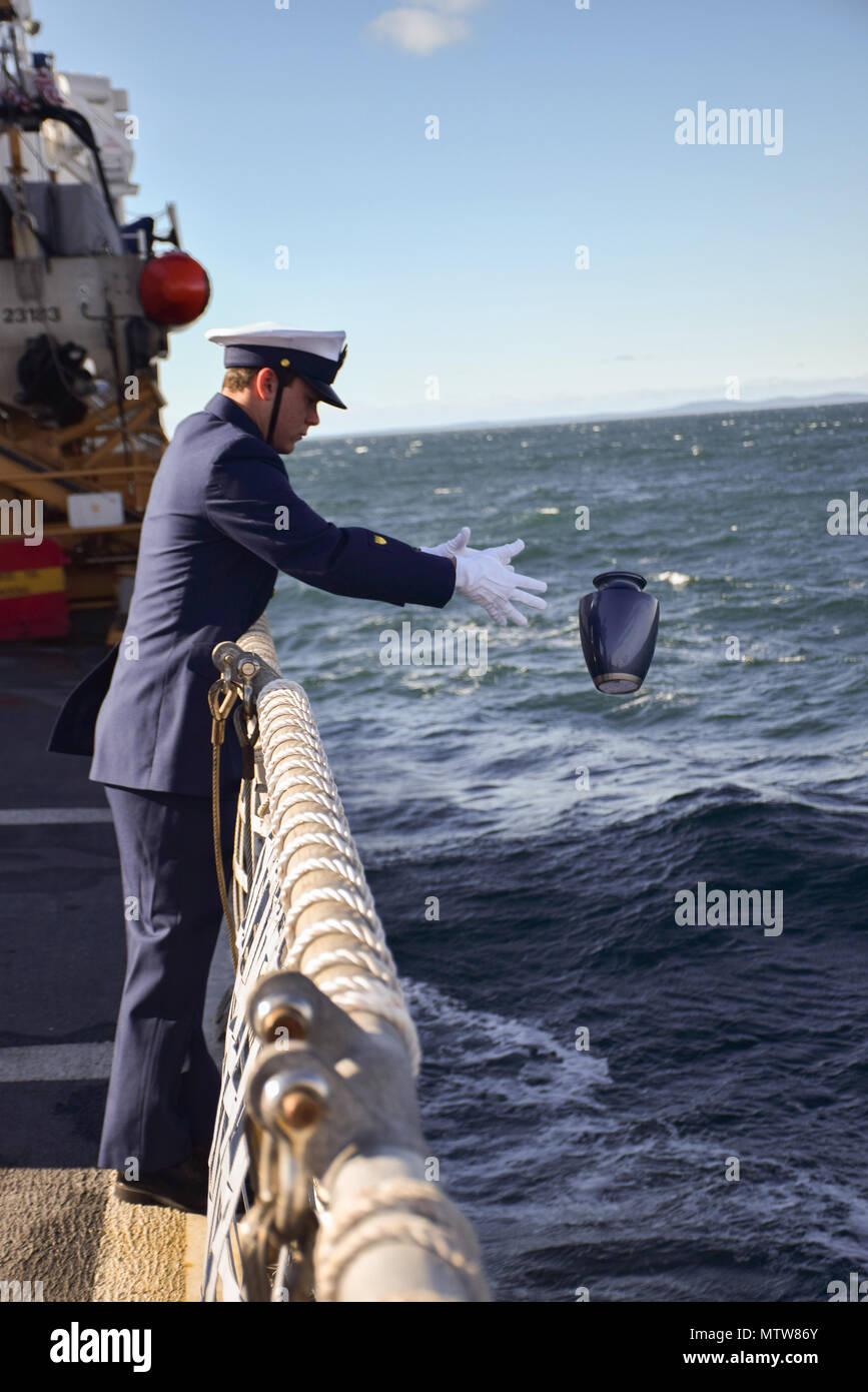 Fireman Mason Weingarten, a crewmember aboard the Boston-based Coast ...