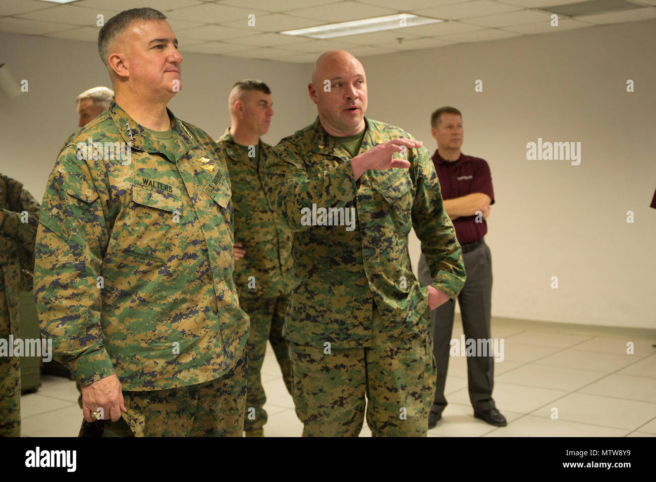 U.S. Marine Corps Maj. Craig L. Smith, right, modeling and simulation officer, II Marine ...