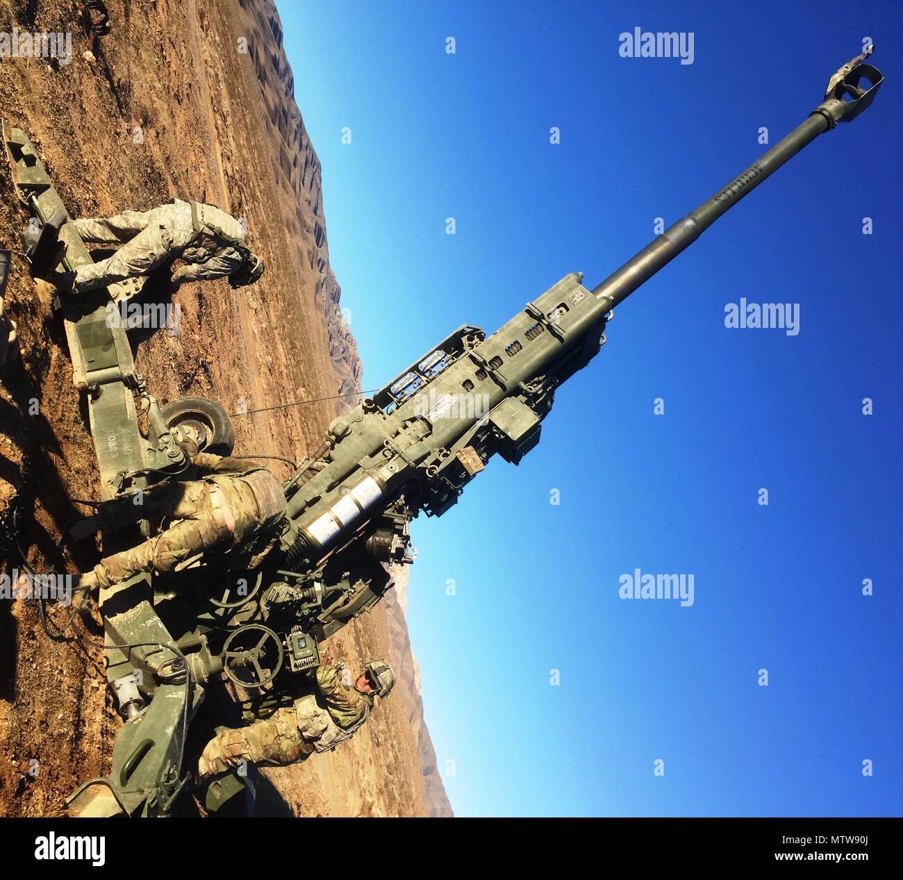 Staff Sgt. Justin George directs his Soldiers with U.S. Army Alaska's ...