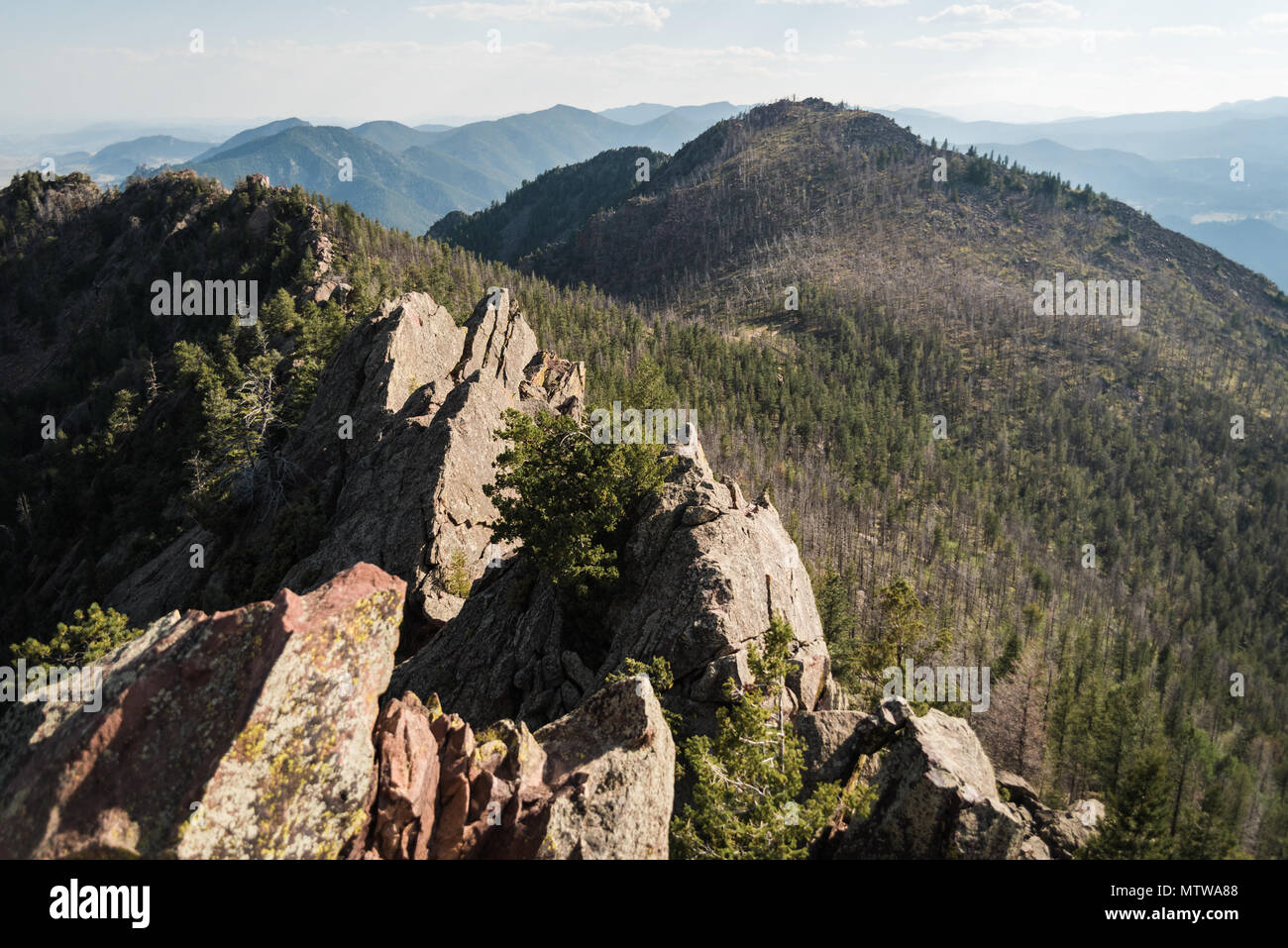 At the summit of Bear Peak in Boulder, Colorado overlooking the Rocky ...