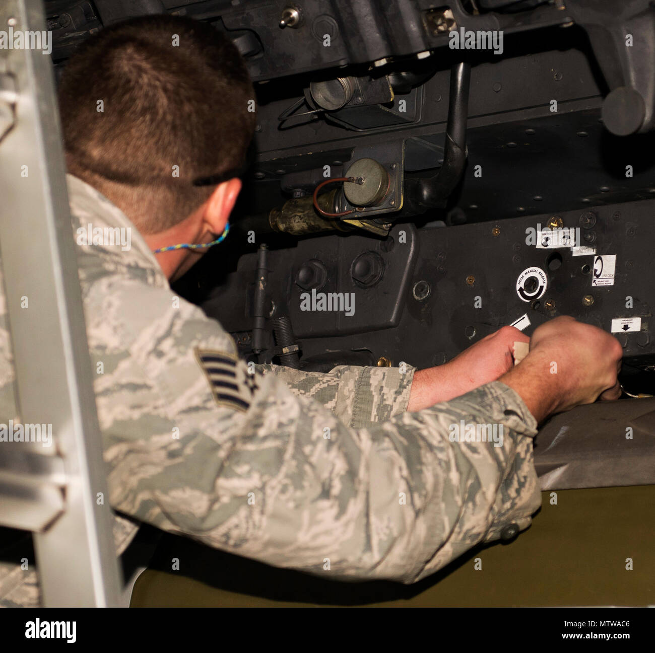 Staff Sgt. Eric Hathaway, 69th Aircraft Maintenance Unit weapons load ...