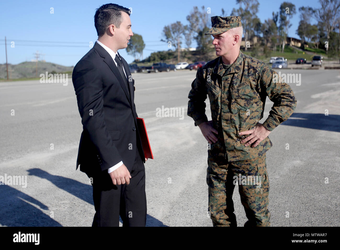 Sgt. Zachary L. Piepenhagen (left), talks to Sgt. Maj. Bradley Kasal ...