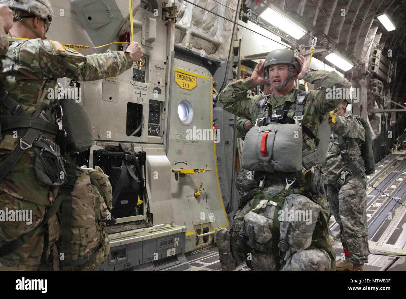 A U.S. Army jumpmaster assigned to the 360th Civil Affairs Brigade ...