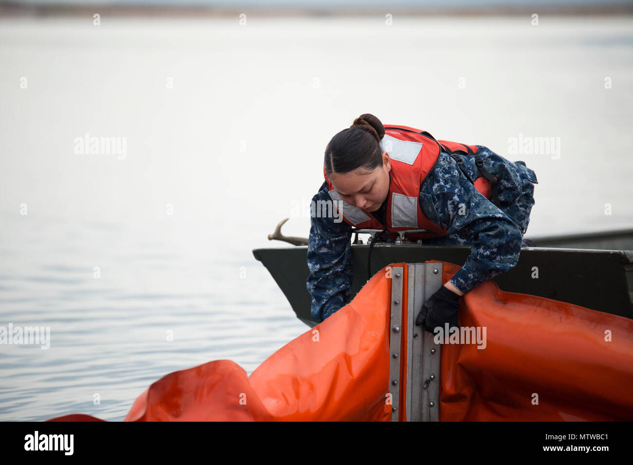 U.S. Navy Engineman 3rd Class, Yajaira Armenta Navarro, with harbor ...