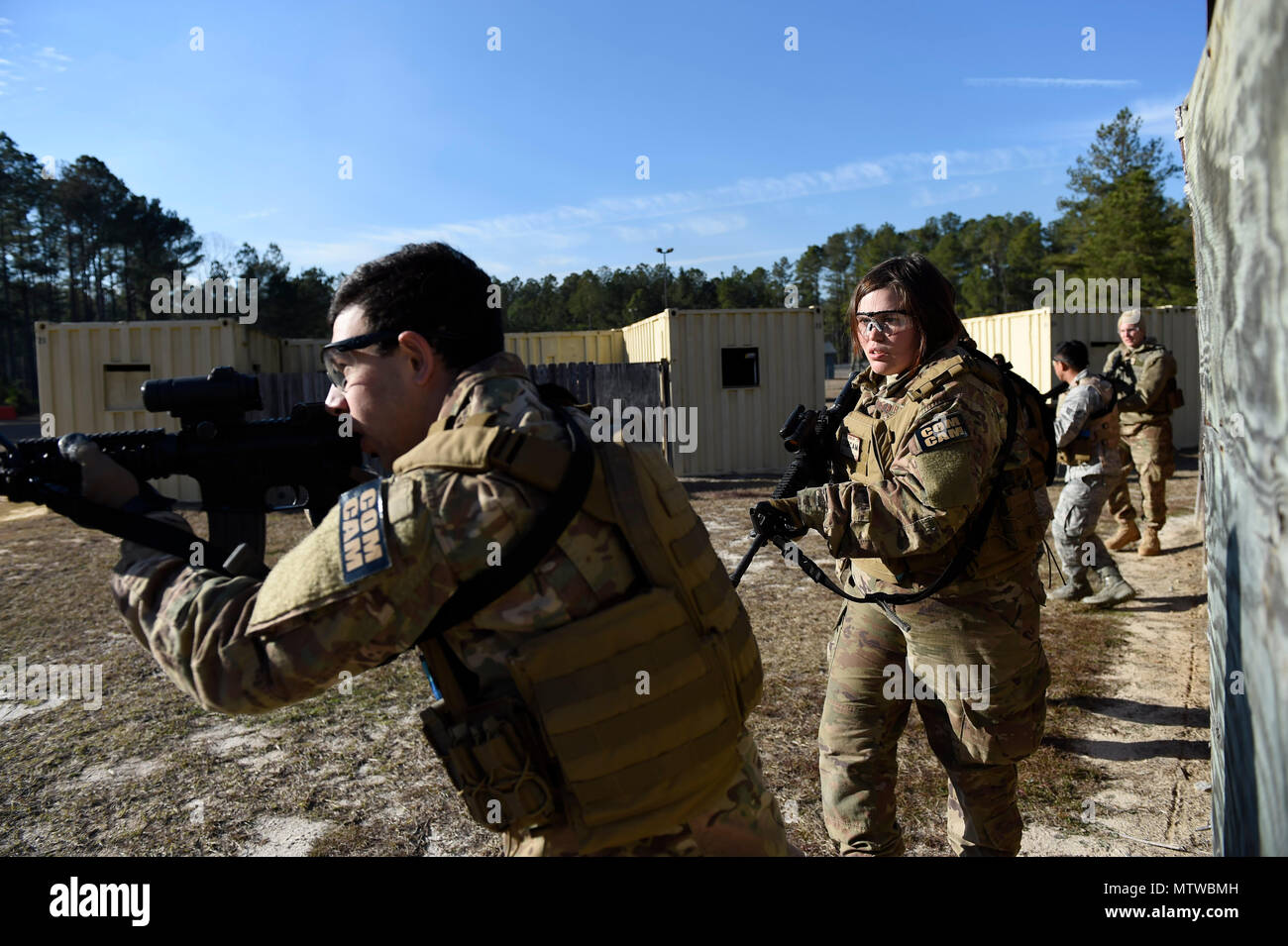 U.S. Air Force Senior Airman Trevor McBride and Senior Airman Ericka ...