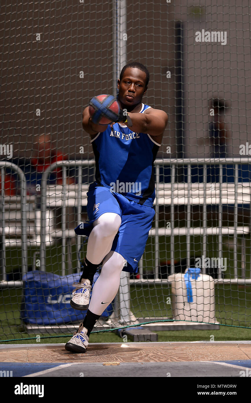 Victor Osinloye, a freshman, competes in the weight throw at the 27th ...