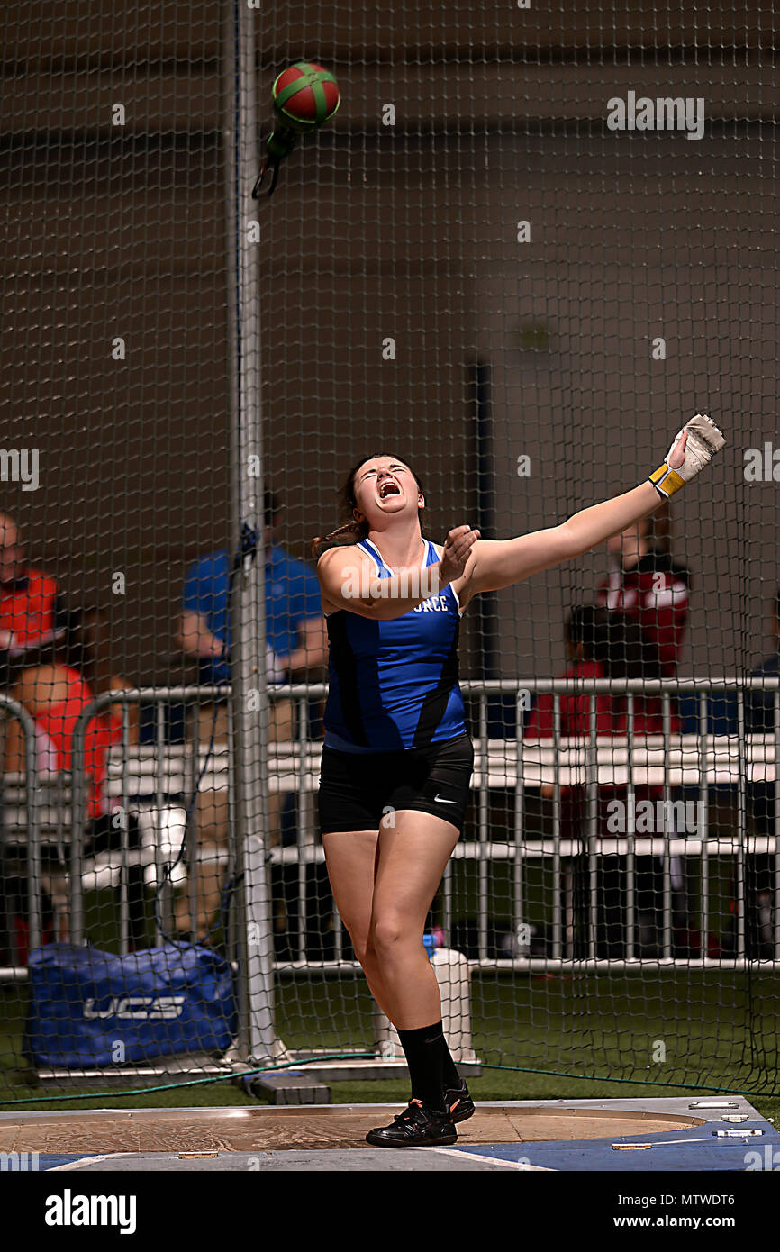 Emily Taylor, a senior, competes in the weight throw at the 27th-annual ...