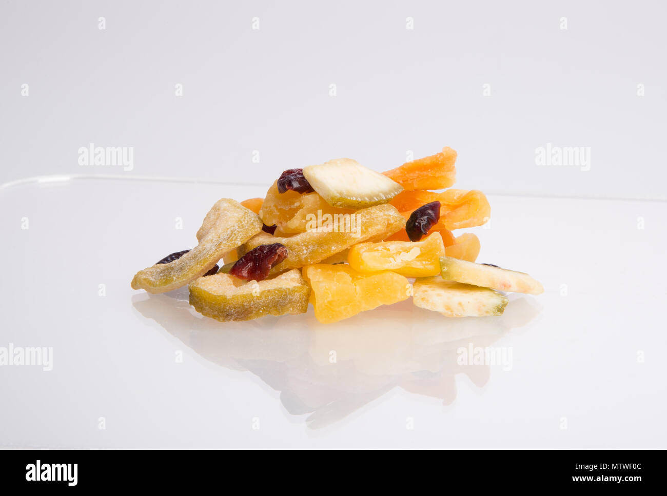 Dried fruits or assorted preserved fruits on background Stock Photo - Alamy
