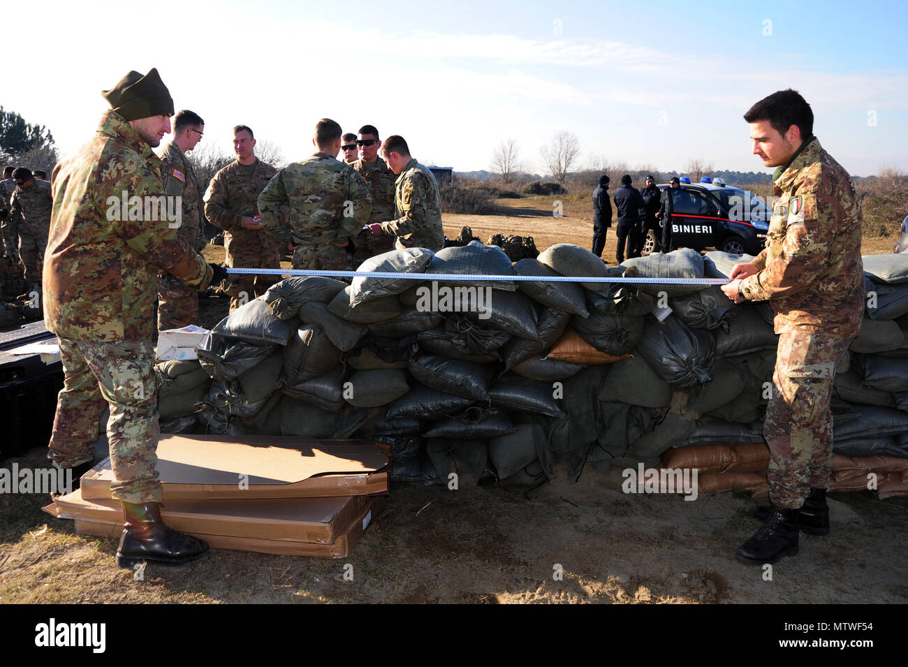 Two Italian Army Soldiers fortify a fighting position before the “Urban ...