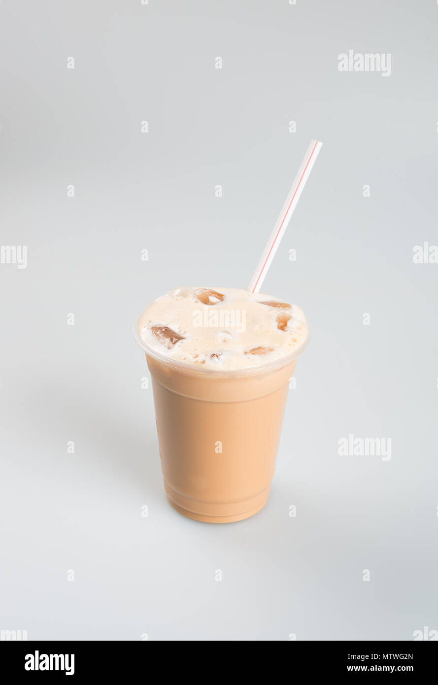 Iced tea or coffee with milk on a background Stock Photo - Alamy
