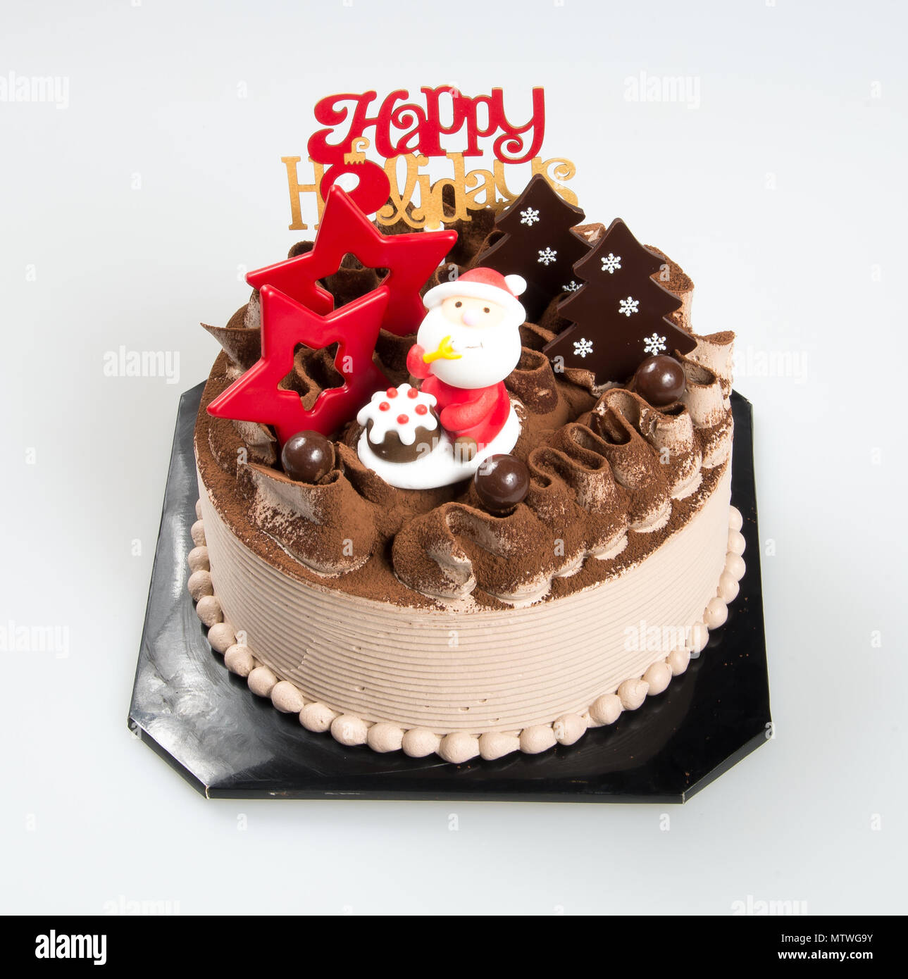 cake or christmas cakes with santa on a background Stock Photo - Alamy