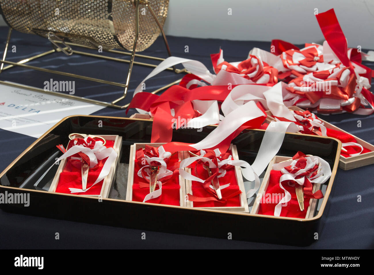 The ribbon-cutting scissors sit on a table during the United Service ...