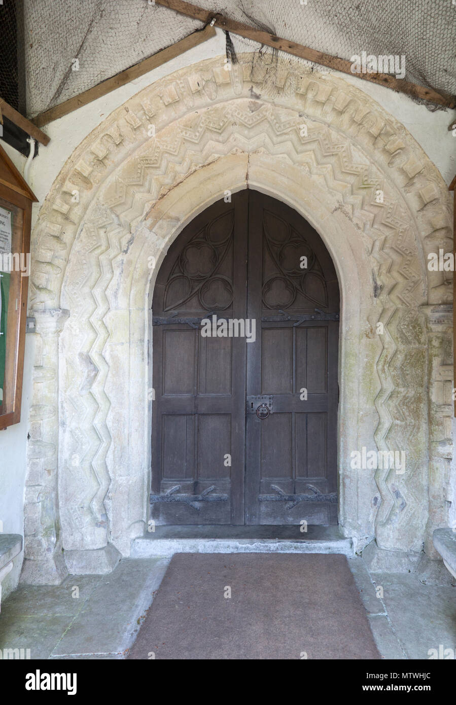 Norman doorway arch village parish church of Saint John the Baptist ...