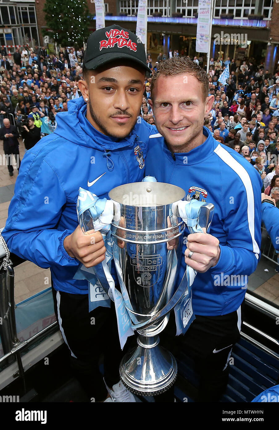 Coventry City's Jodi Jones (left) and Stuart Beavon with the trophy ...