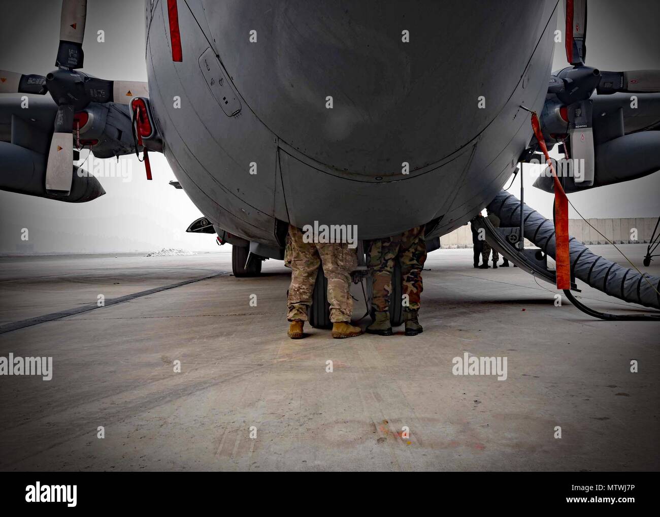 A C-130H maintenance advisor from Train, Advise, Assist Command-Air (TAAC-Air), 440th Air ...