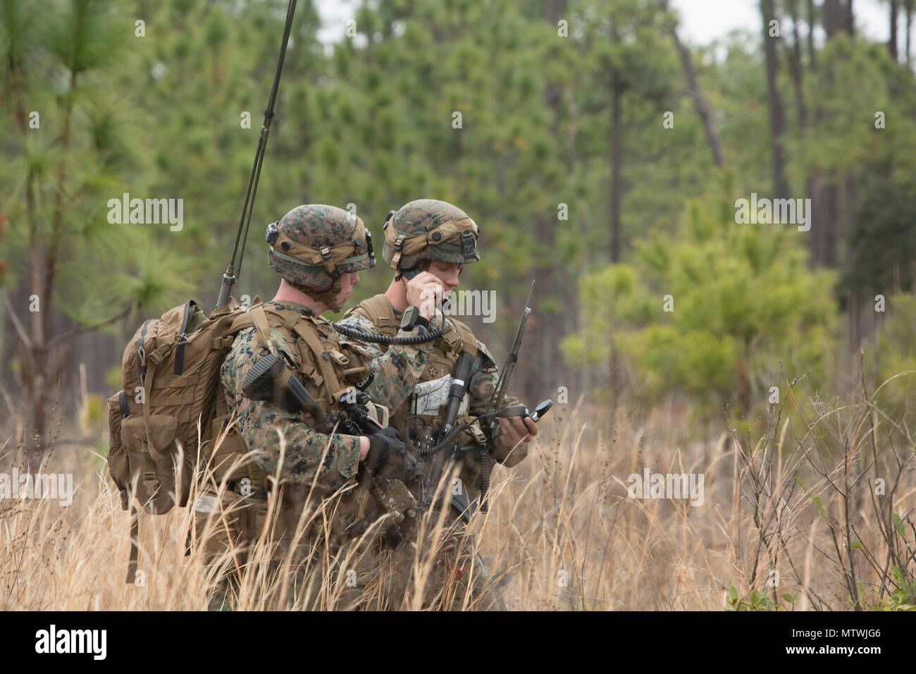 U.S. Marine Corps 2nd Lt. Jordan I. Spear, right, infantry officer with ...