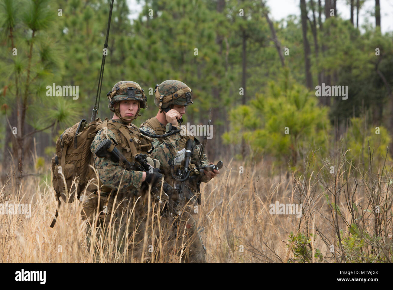 U.S. Marine Corps 2nd Lt. Jordan I. Spear, right, infantry officer with ...