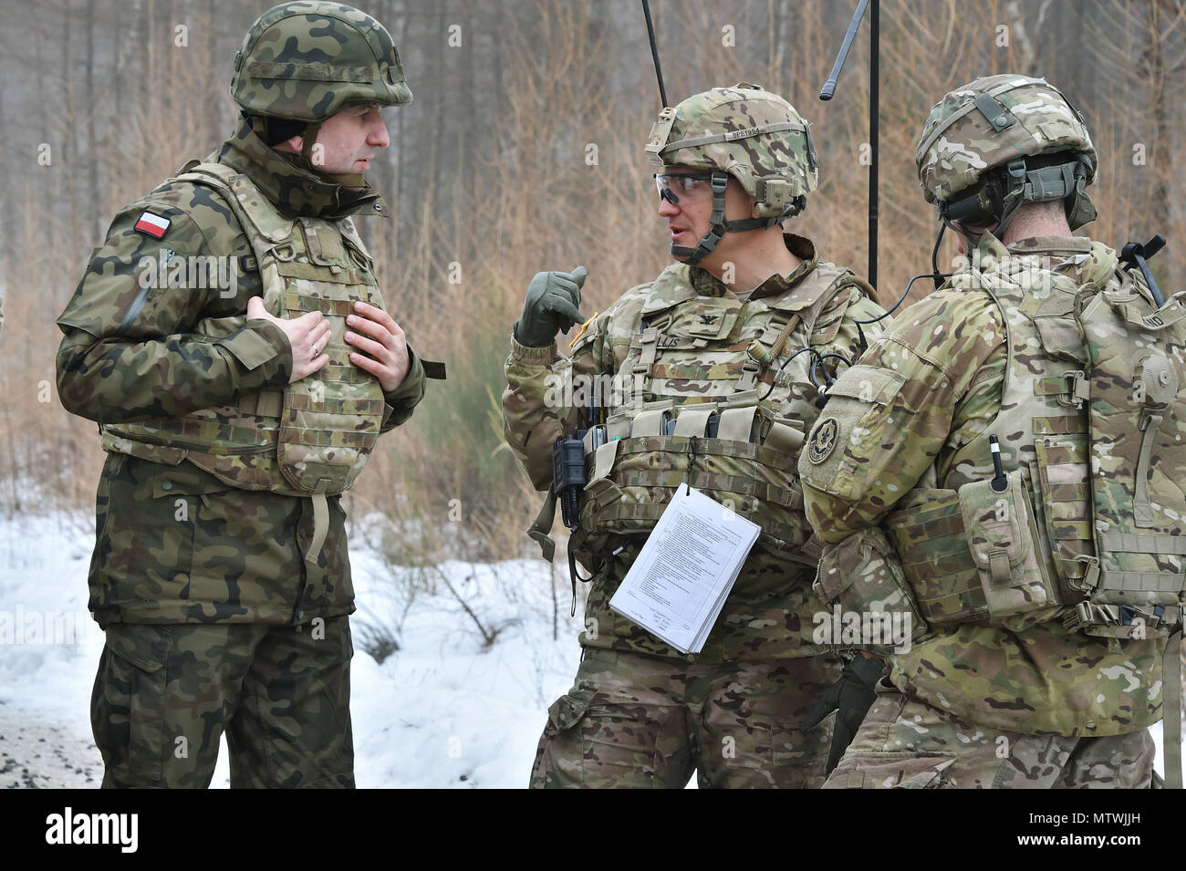 From left to right, Brig. Gen. Jaroslaw Gromadzinski, Commander of the ...