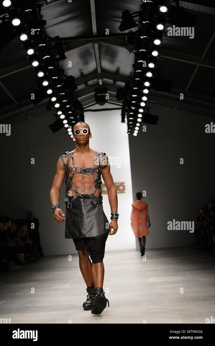 UK Fashion - Model on the runway during the KTZ Spring Summer ...