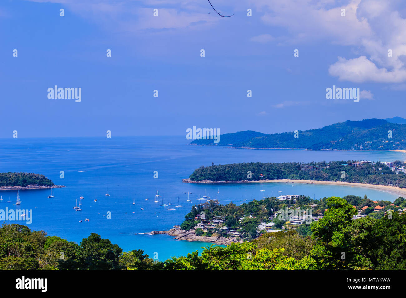 Beautiful landscape of turquoise ocean waves with boats, coastline and ...