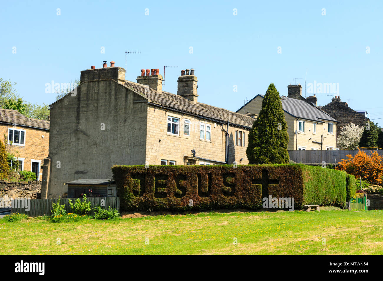 Jesus in topiary Stock Photo - Alamy