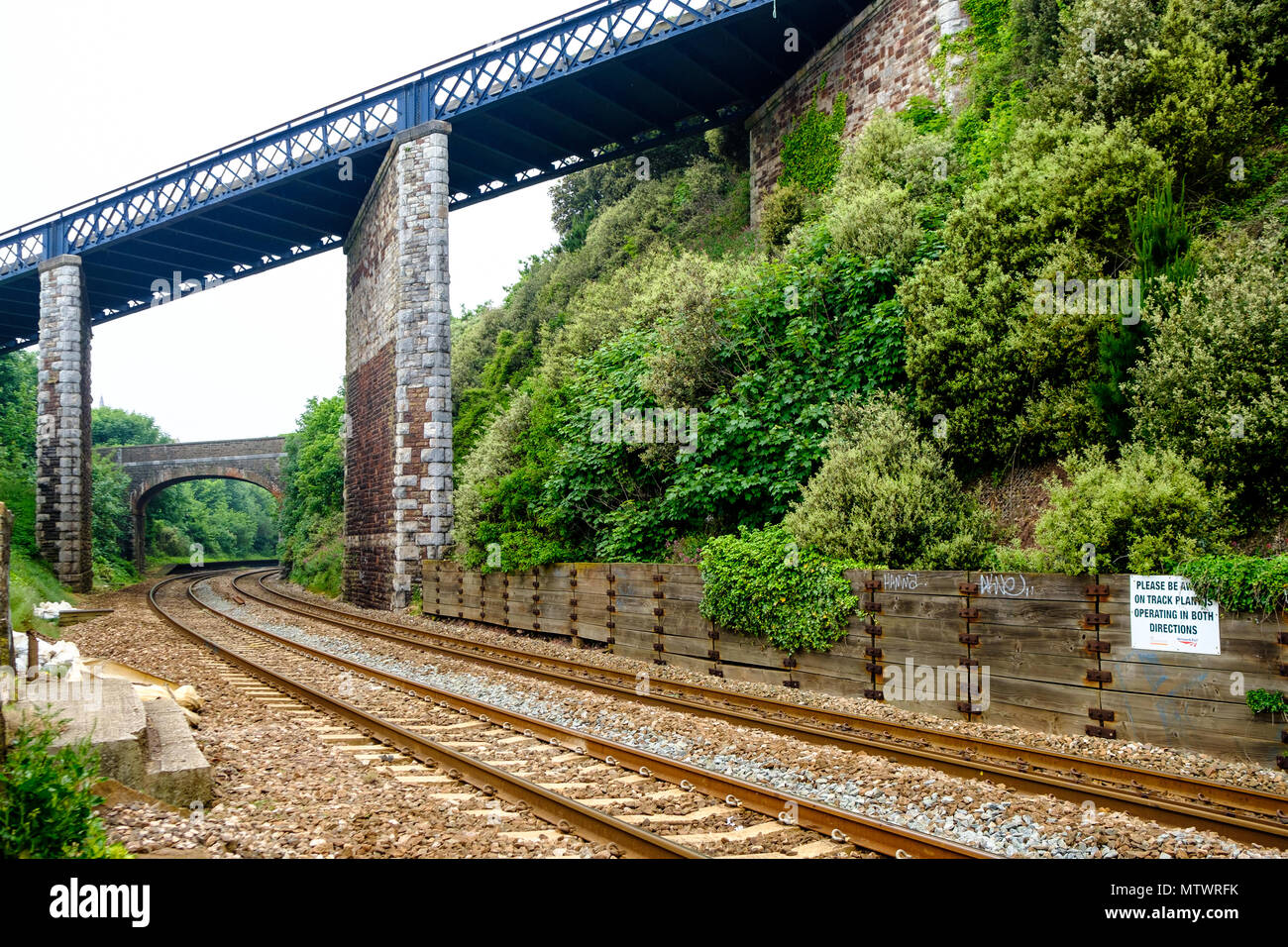 The Cornish main line railway as it passes through Teignmouth under ...