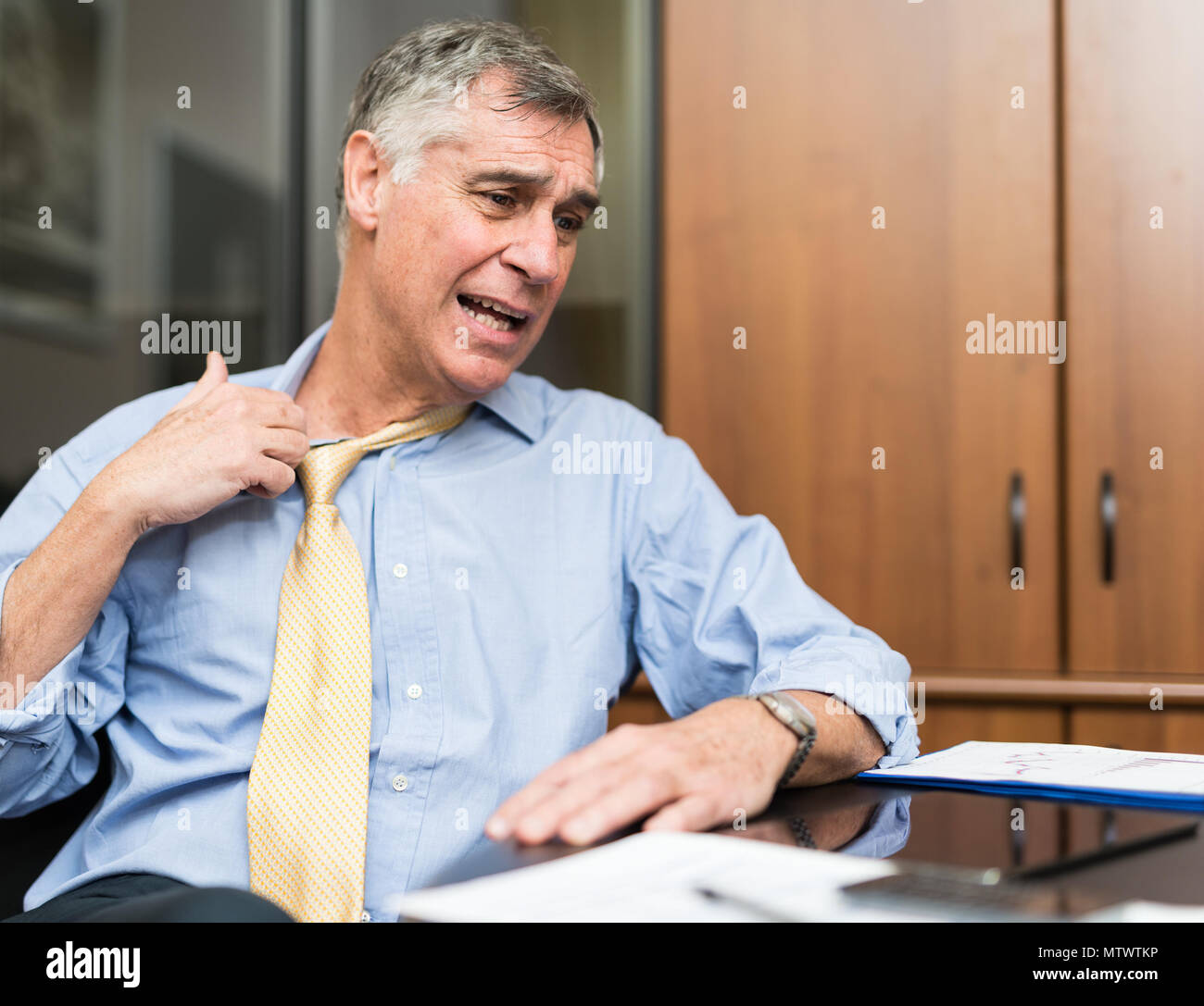 Sweating office hi-res stock photography and images - Alamy