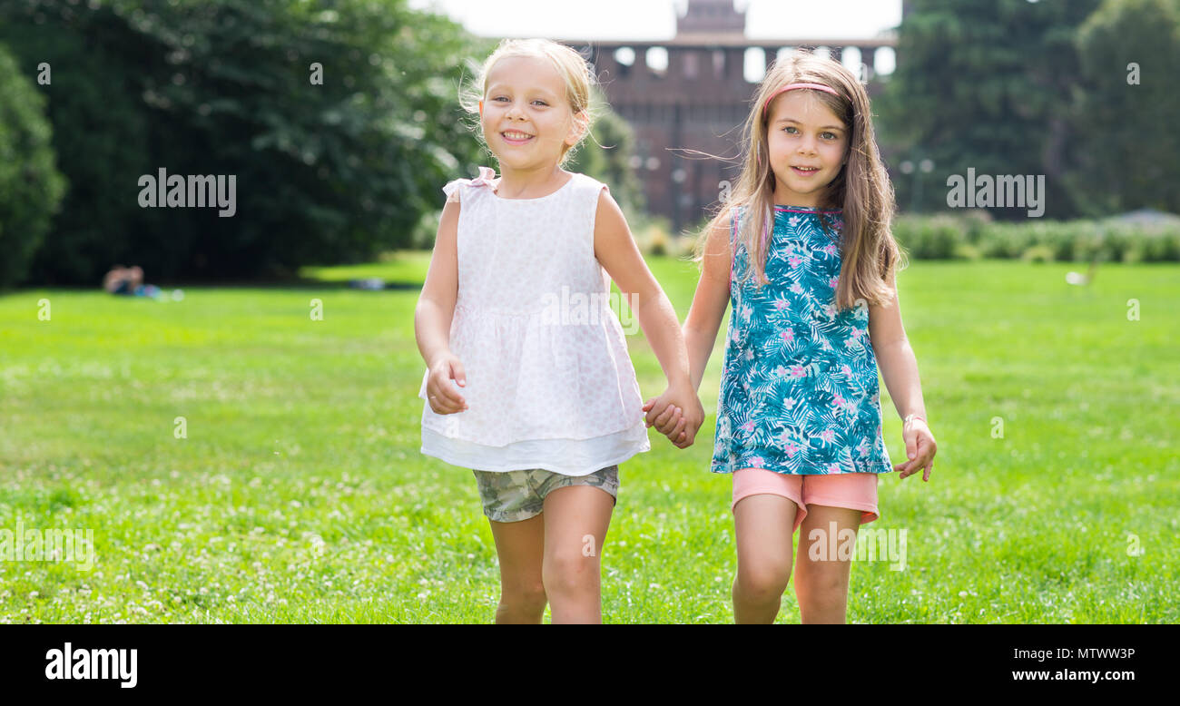 Children friends walking together outdoor Stock Photo - Alamy