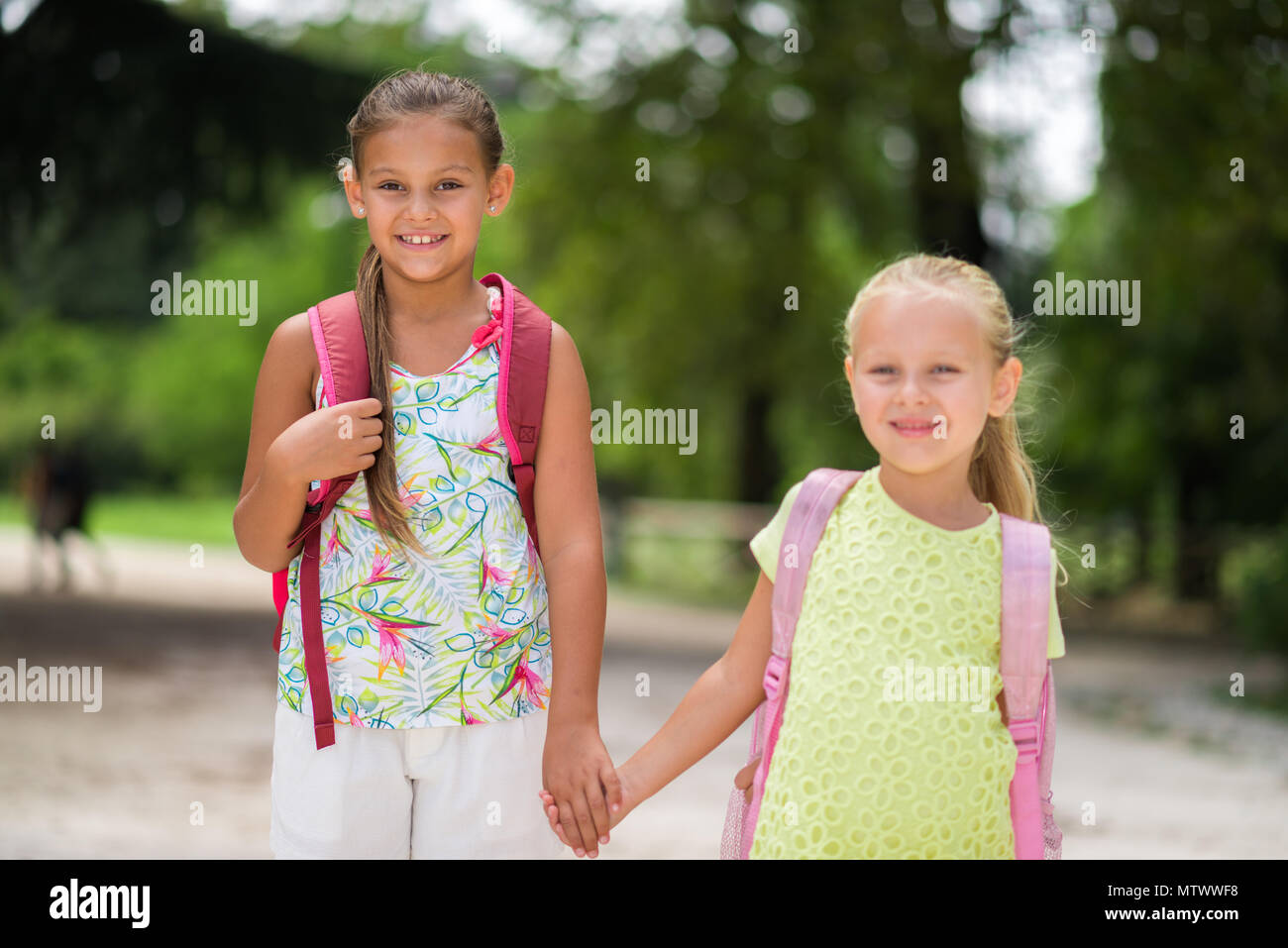 Girls going to school hi-res stock photography and images - Alamy