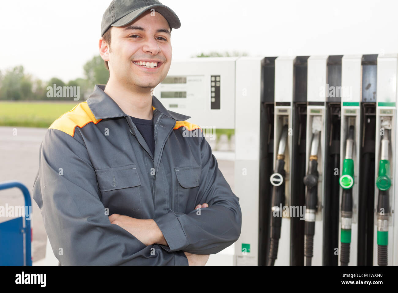 Happy petrol pump worker hi-res stock photography and images - Alamy