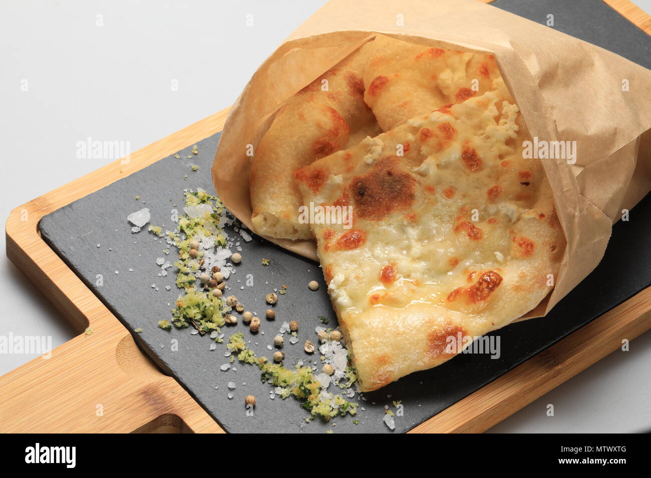 Garlic bread in paper bag Stock Photo - Alamy