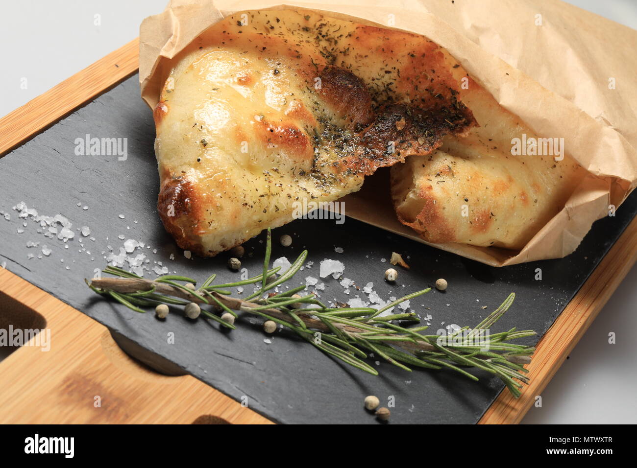 Garlic bread in paper bag Stock Photo - Alamy