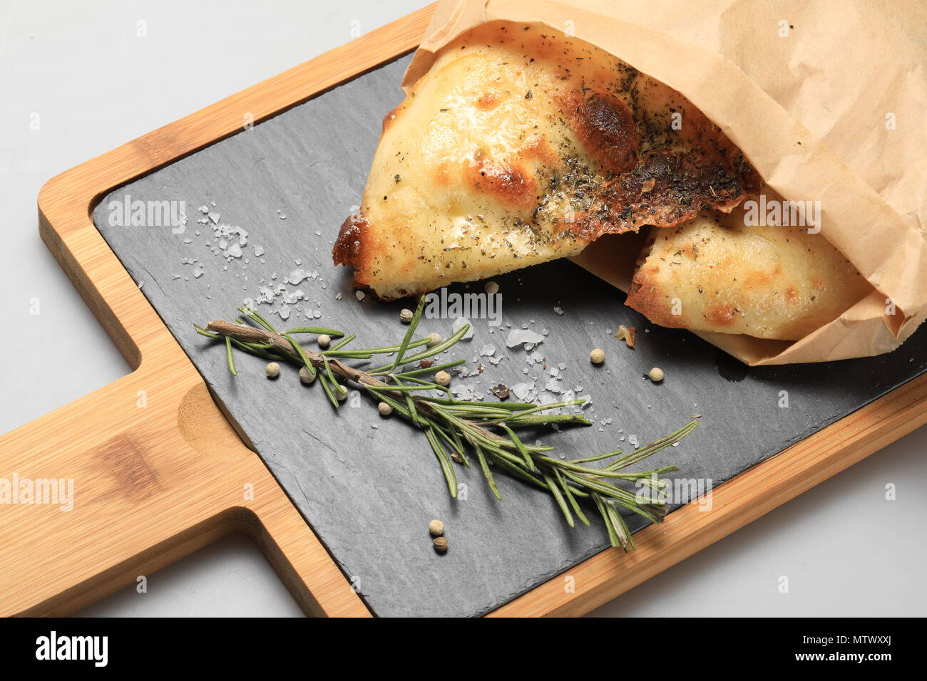 Garlic bread in paper bag Stock Photo - Alamy