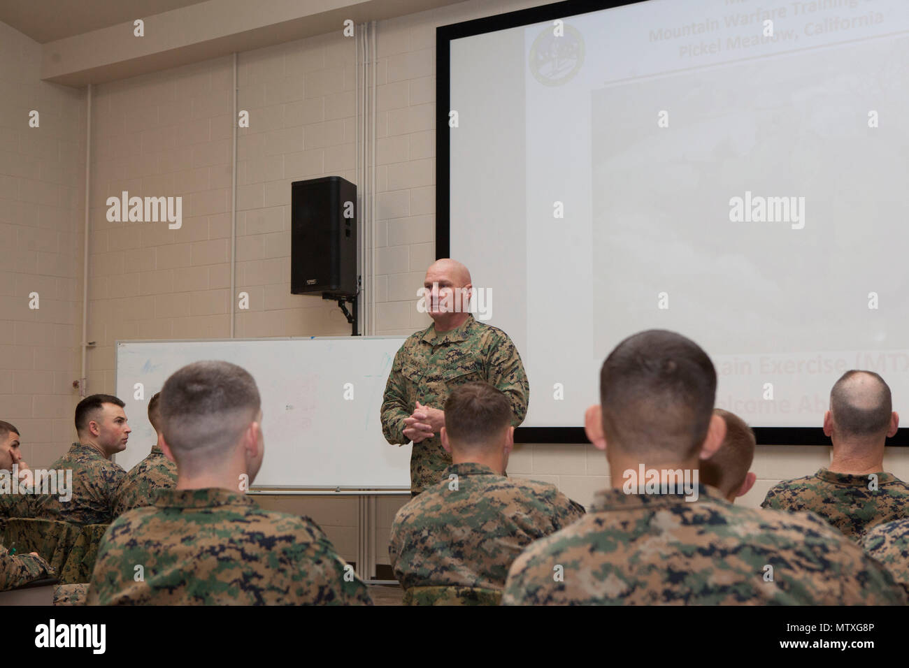 U.S. Marines with 2nd Battalion, 2nd Marine Regiment (2/2), attend a ...