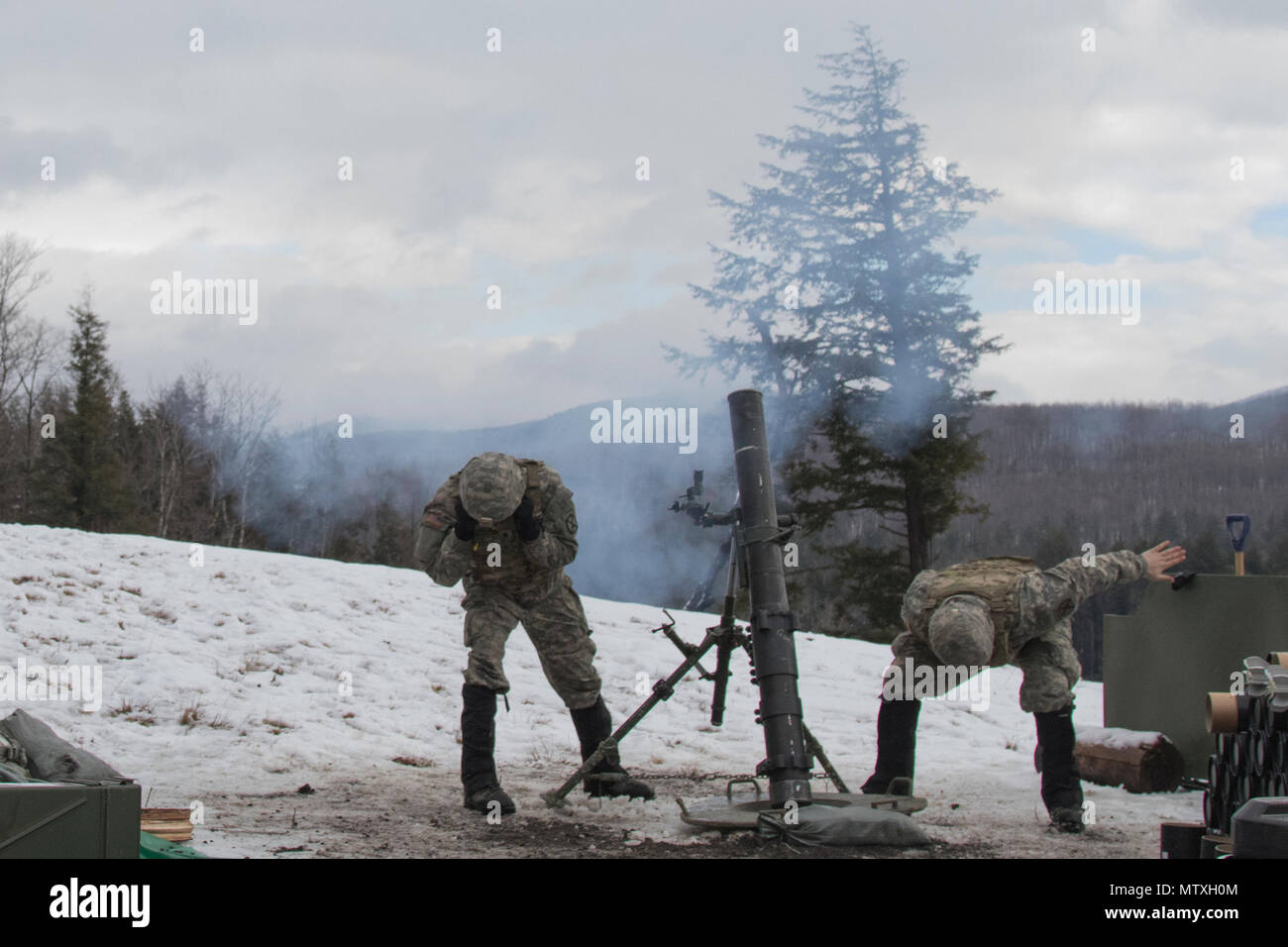 U.S. Army Spc. Anthony Wheeler, left, and Pfc. Braden Yeates, right ...