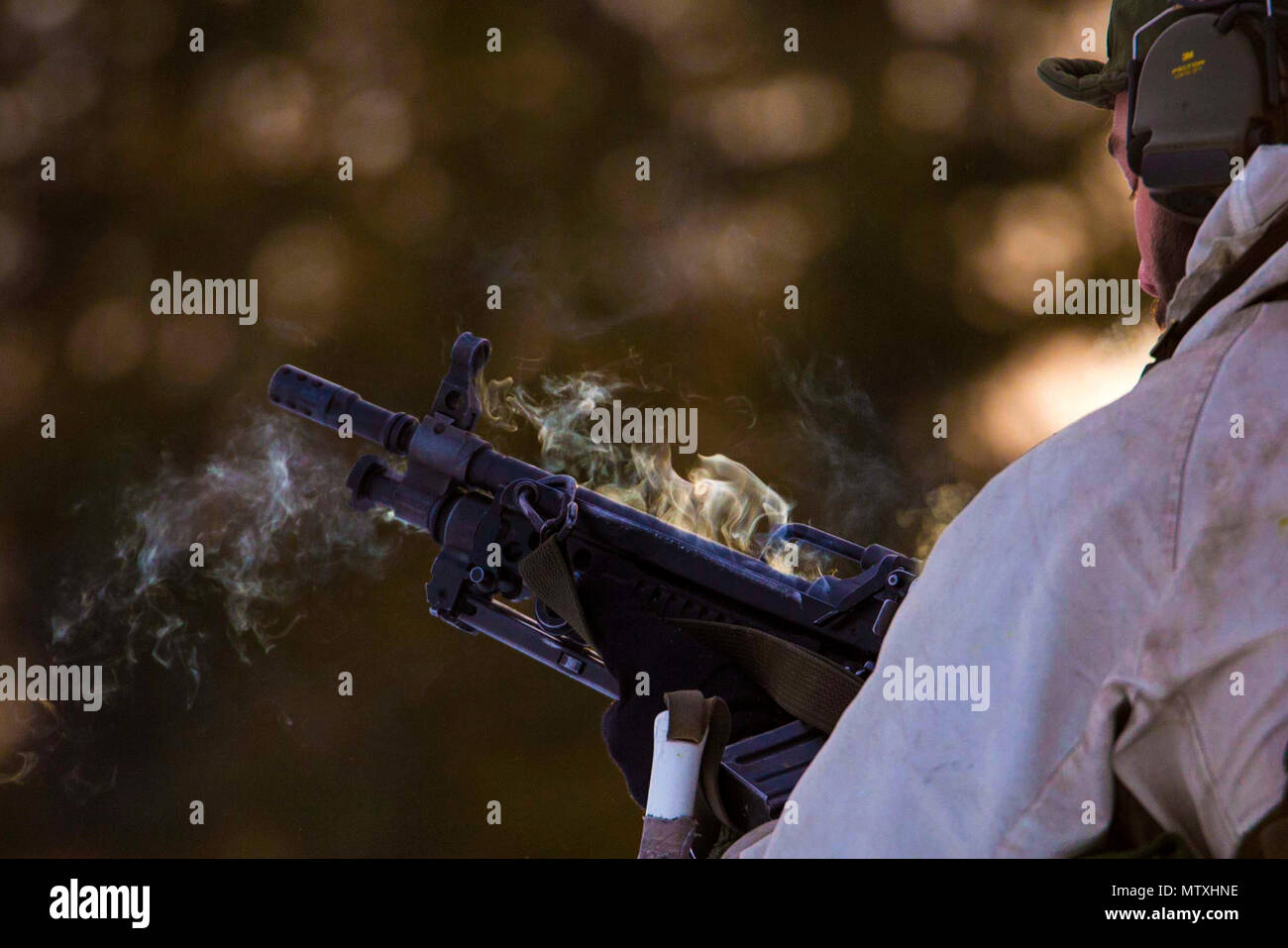 Student in the Swedish Basic Winter Warfare Course waits for his FN ...