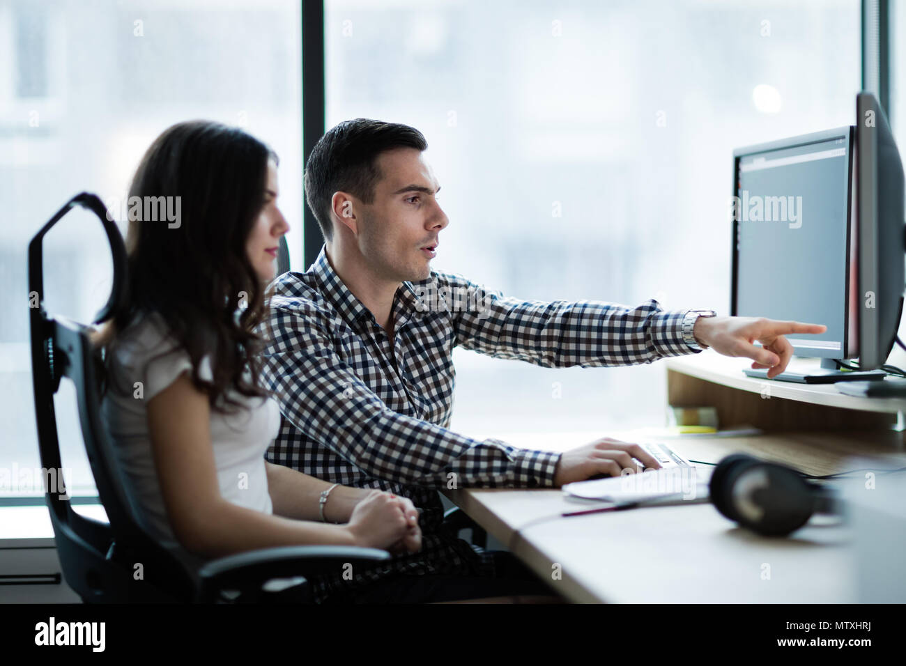 Picture of business people working together in office Stock Photo - Alamy