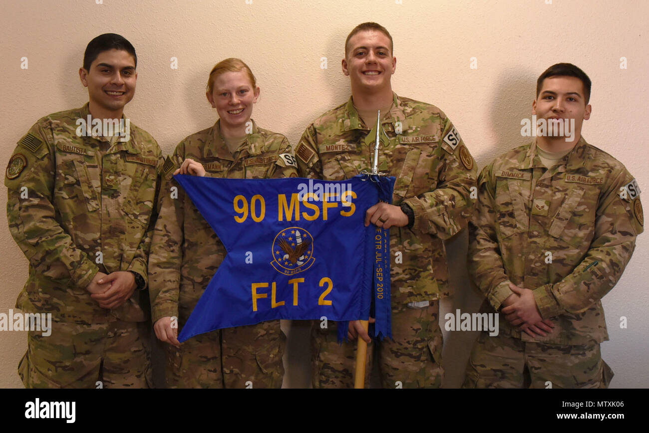 Airmen with the 90th Missile Security Forces Squadron pose for a group photo at F.E. Warren Air ...