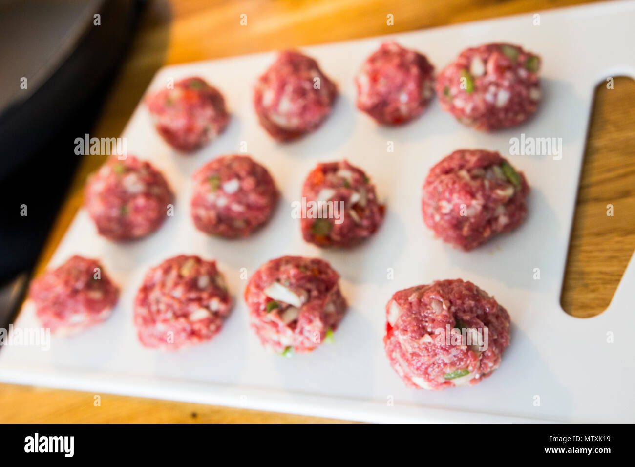 Making meatballs in a kitchen Stock Photo - Alamy