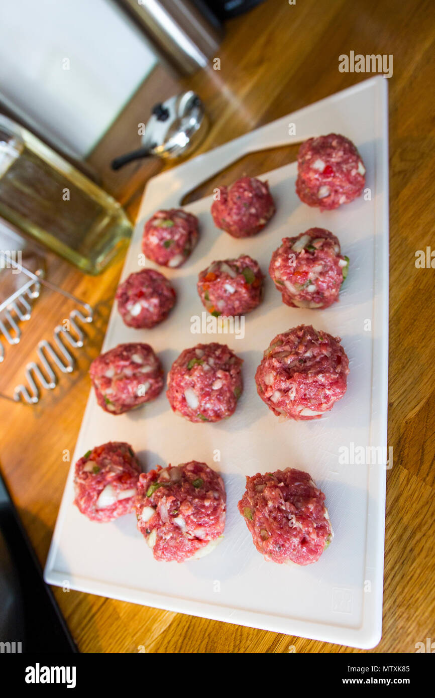 Making meatballs in a kitchen Stock Photo - Alamy