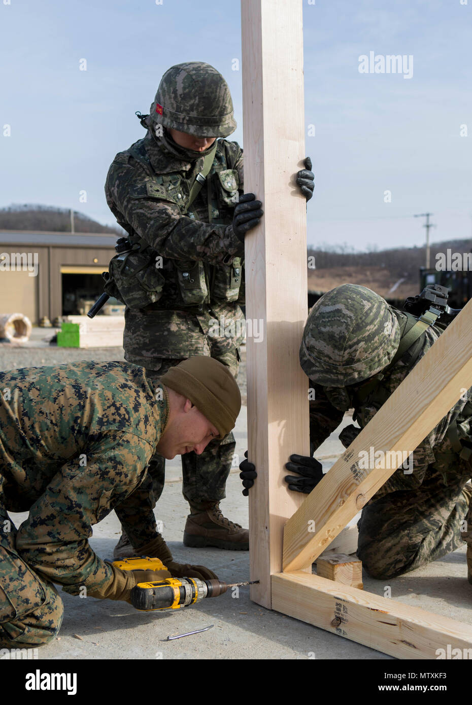 U.S. Marines, with Alpha Company, 9th Engineer Support Battalion, 3rd ...