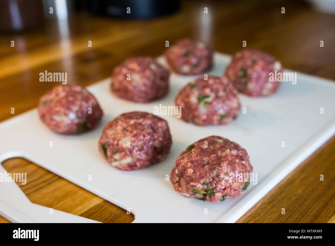 Making meatballs in a kitchen Stock Photo - Alamy
