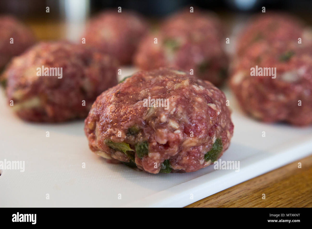 Making meatballs in a kitchen Stock Photo - Alamy