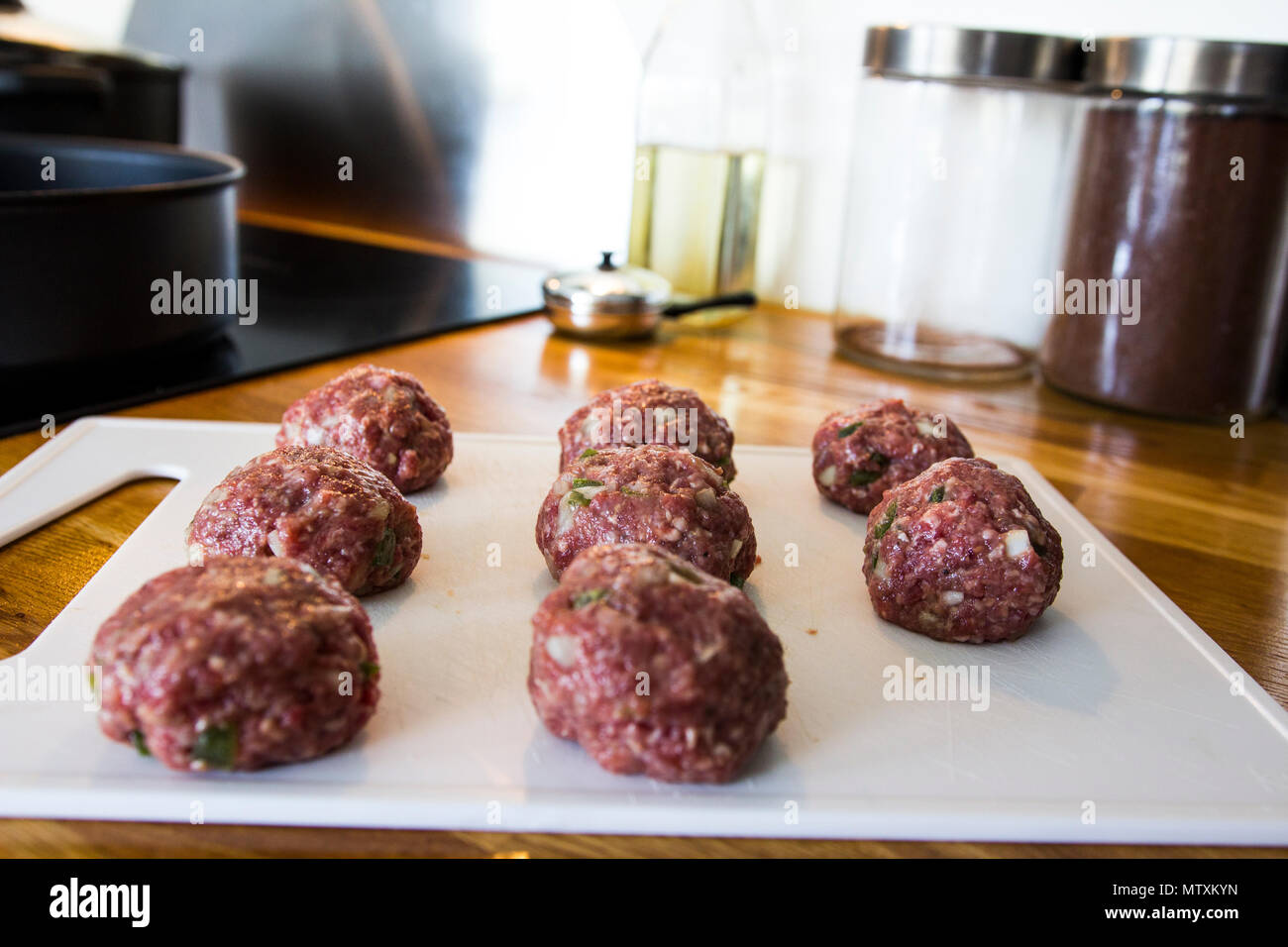 Making meatballs in a kitchen Stock Photo - Alamy
