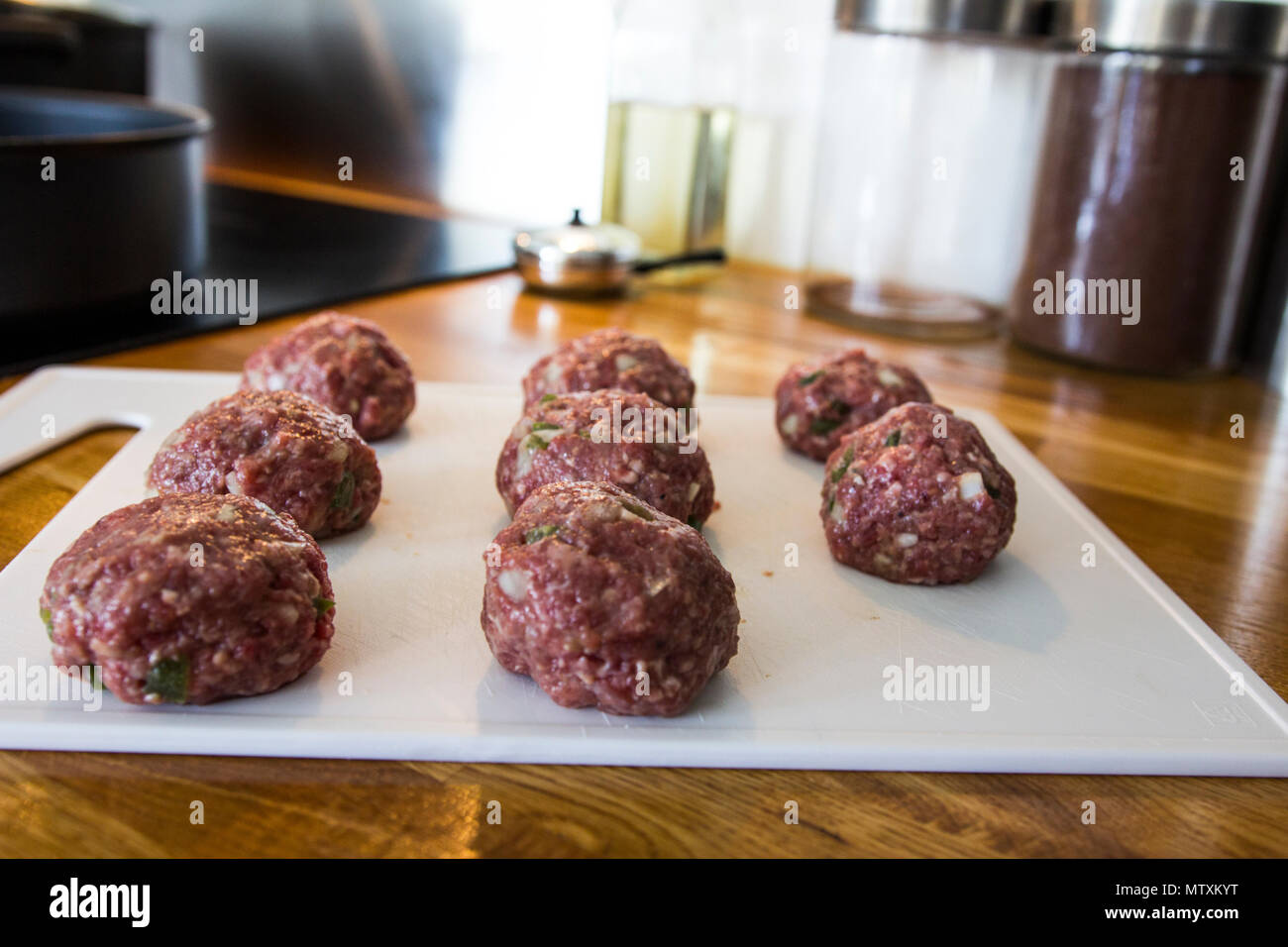Making meatballs in a kitchen Stock Photo - Alamy
