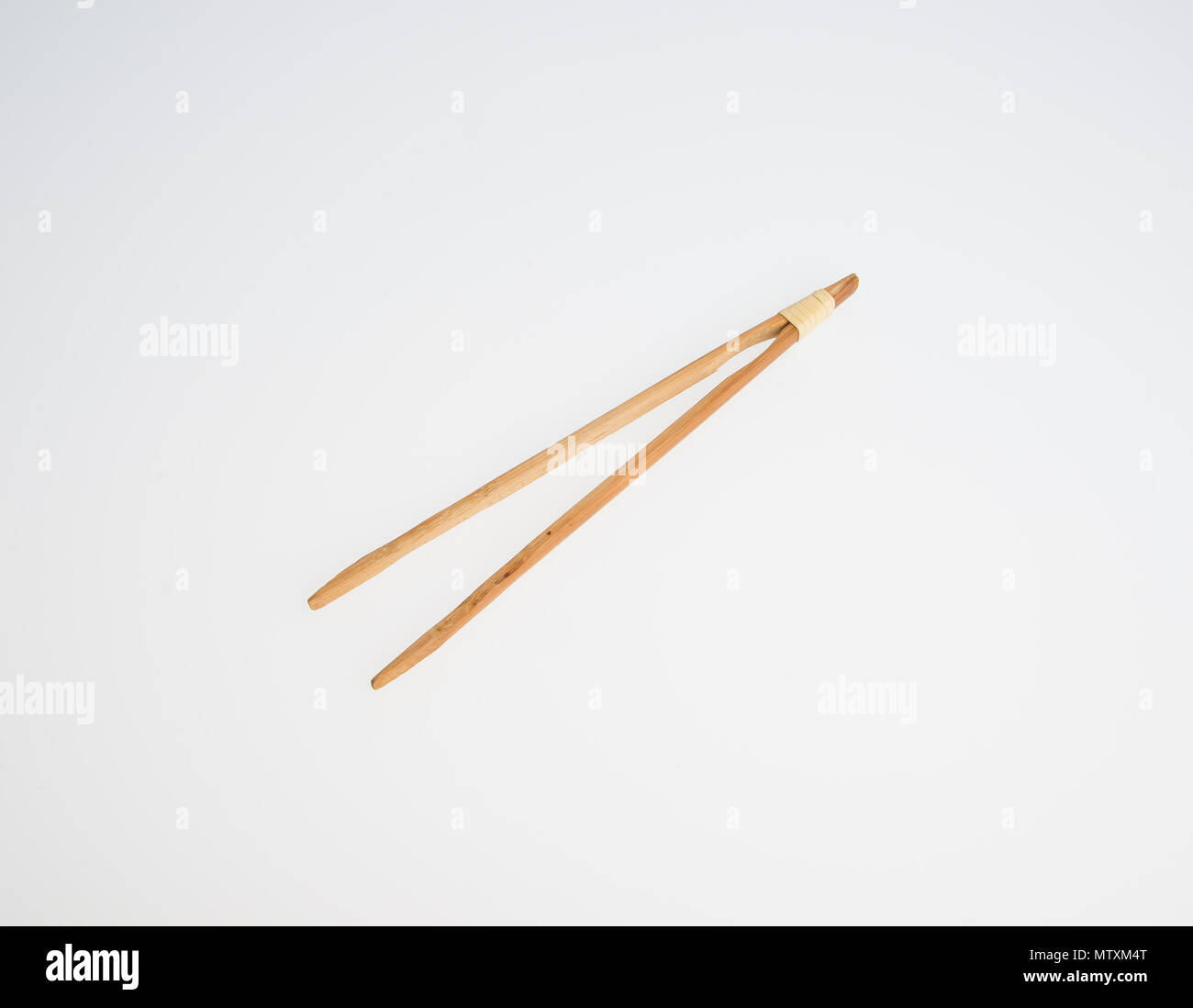 Wood tongs isolated on white hi-res stock photography and images - Alamy