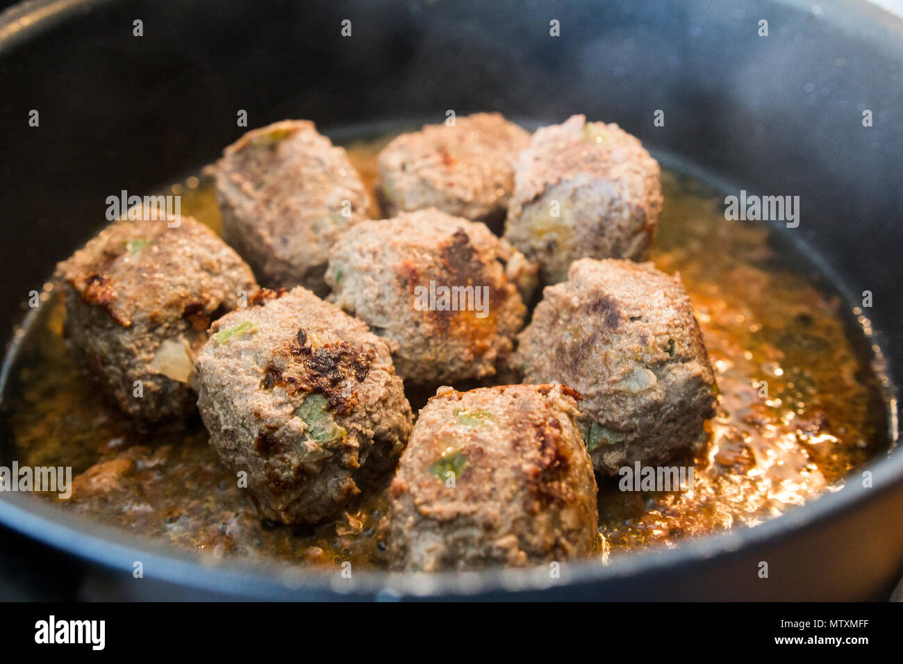 Making meatballs in a kitchen Stock Photo - Alamy